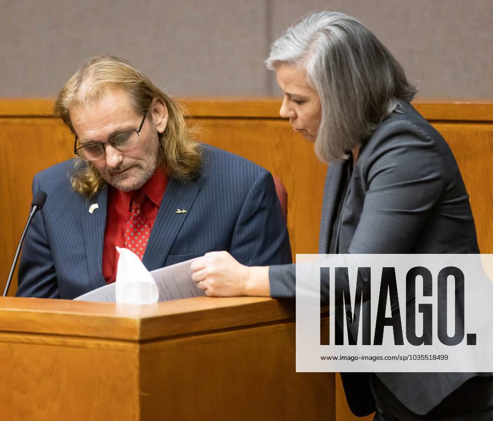 Syndication: Ocala StarBanner Witness Stanley Lacy, left, is asked to ...