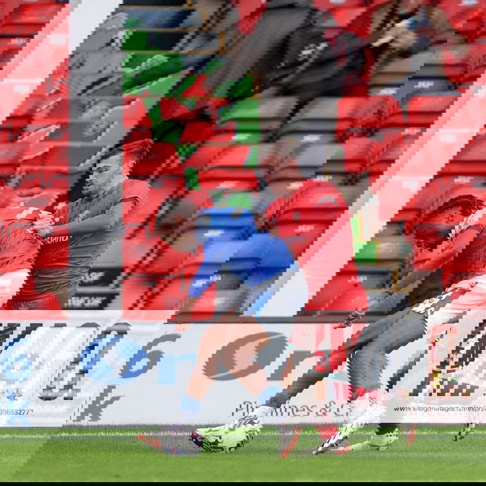 Gillingham s Cheye Alexander & Walsall s Oisin McEntee battle for ...