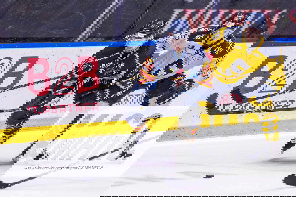 231014 Djurgardens Daniel Brodin and Södertäljes Albin Carlson during ...