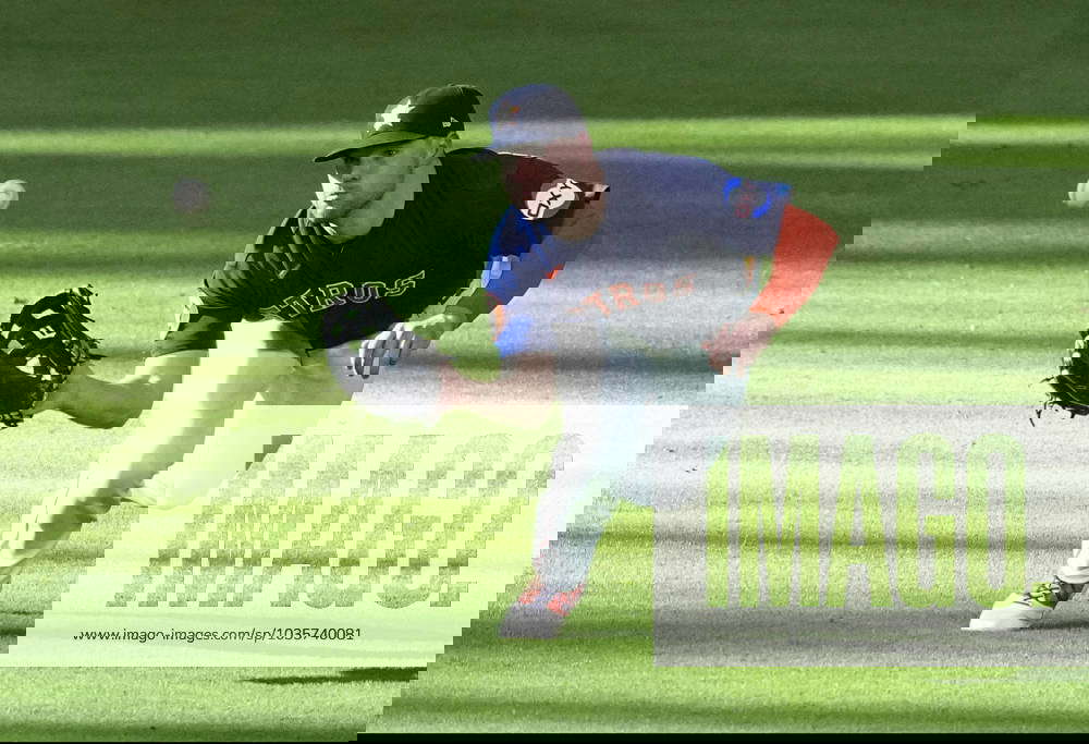 Houston Astros center fielder Chas McCormick makes a diving catch on a drive from Texas Rangers