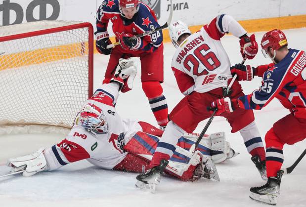 RUSSIA, MOSCOW - : Lokomotiv goaltender Daniil Isayev defensd against ...