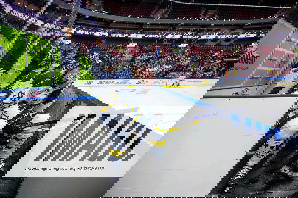 231024 HV71s Joonas Nättinen falls down during the SHL ice hockey match between Malmö Redhawks and