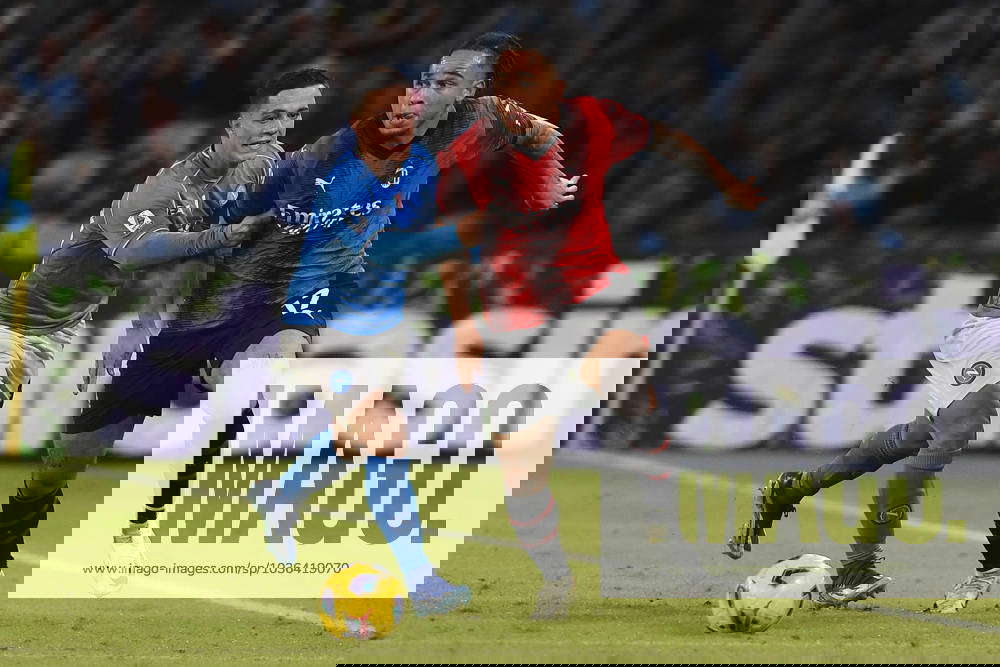 Noah Okafor of AC Milan competes for the ball with Giacomo Raspadori of ...