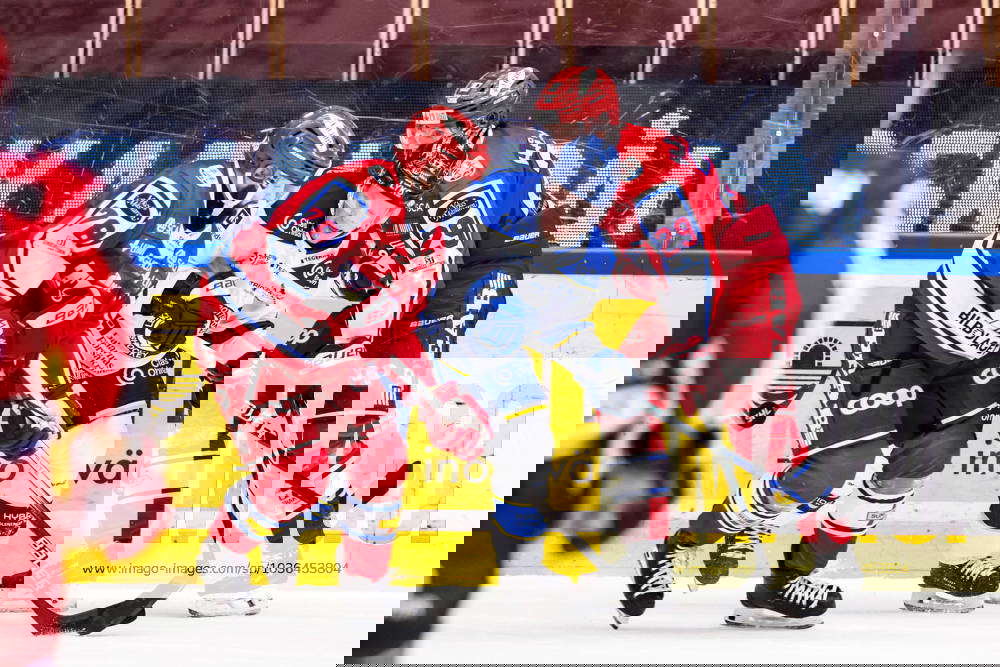 Timras Robin Hanzl and Leksands Kalle Östman and Timras Filip Hallander during the ice hockey match