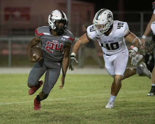 Syndication: News-Journal West Florida s Christopher Oliver slips out ...