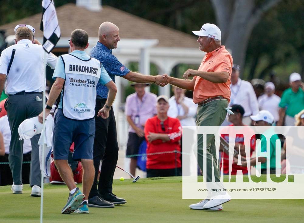 Syndication: Palm Beach Post Rob Labritz and Ken Duke celebrate on the ...