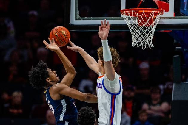 : Virginia Cavaliers guard Leon Bond III shoots over North Carolina A&T ...