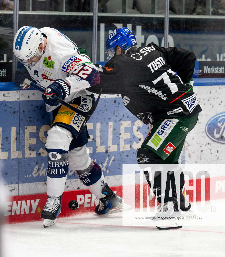 Battle for the puck duel between Marcel Noebels Eisbaeren Berlin, 92 ...