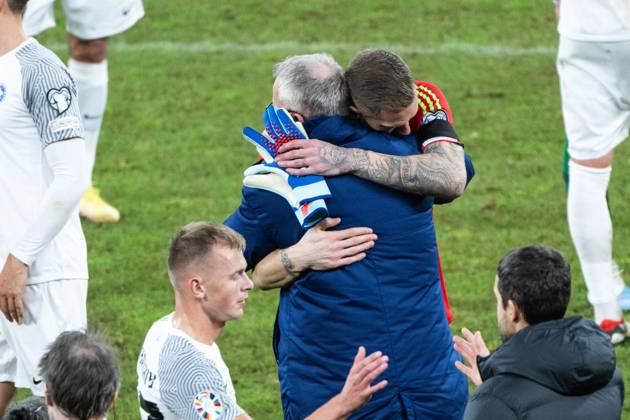 Goalkeeper Robin Olsen and head coach Janne Andersson of the Swedish ...