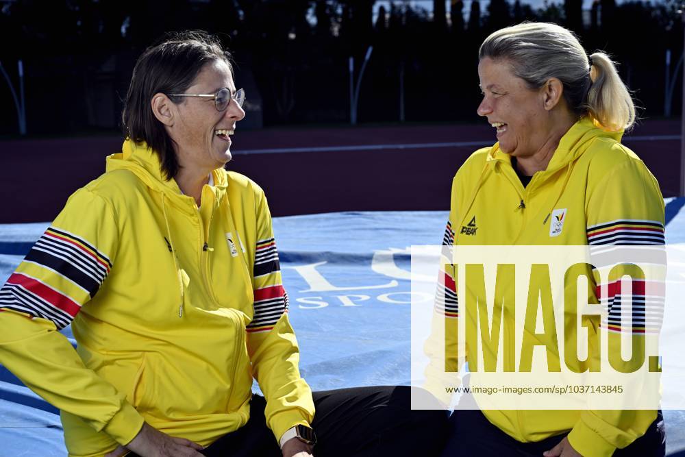 Coach Tia Hellebaut and coach Brigitte Becue pose for the photographer ...