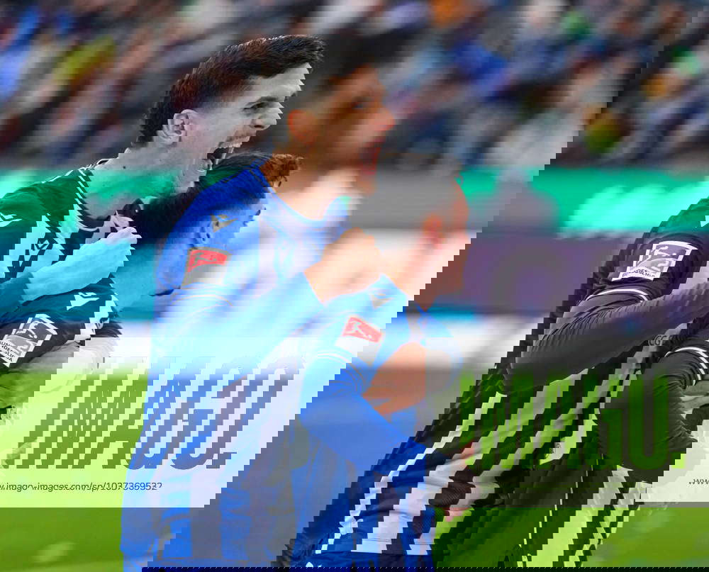 Igor Matanovic Karlsruher SC, 9, left, is happy with Paul Nebel ...