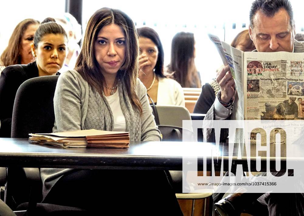 Syndication: Palm Beach Post Attorney Brian Claypool reads a newspaper ...