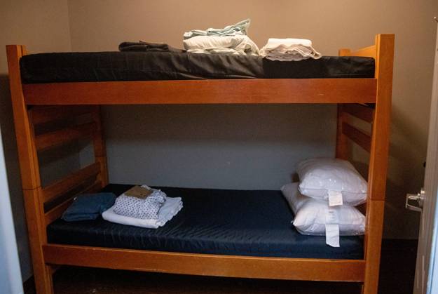 Syndication: The Indianapolis Star Residents stay in dorm-style rooms ...