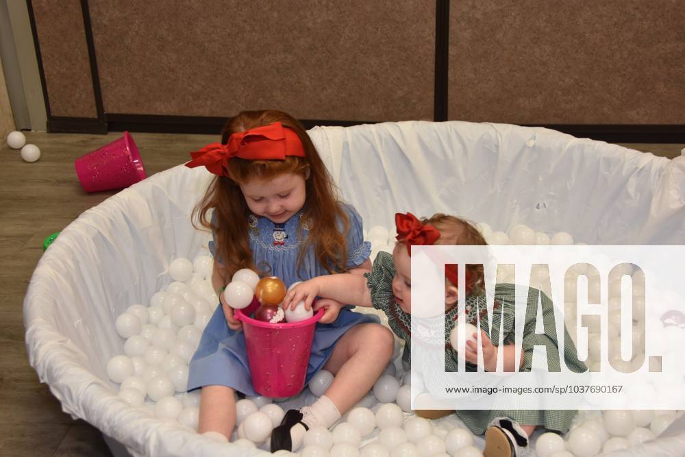 Syndication: Houma Today Valerie and Vivian Richard play in the ...