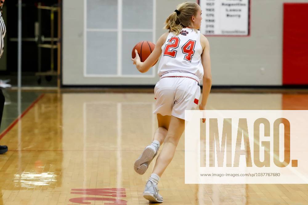 Syndication: The Daily Record Norwayne s Grace Wolf races up the floor ...