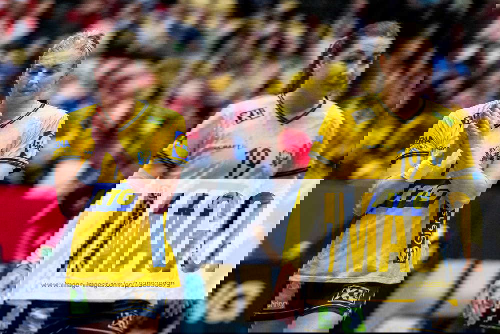 231215 Linn Blohm and Anna Lagerquist of Sweden looks dejected during the IHF Women?s World