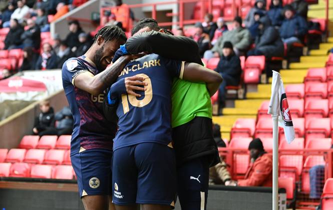 Ephron Mason-Clark of Peterborough United battles with Tashan Oakley ...