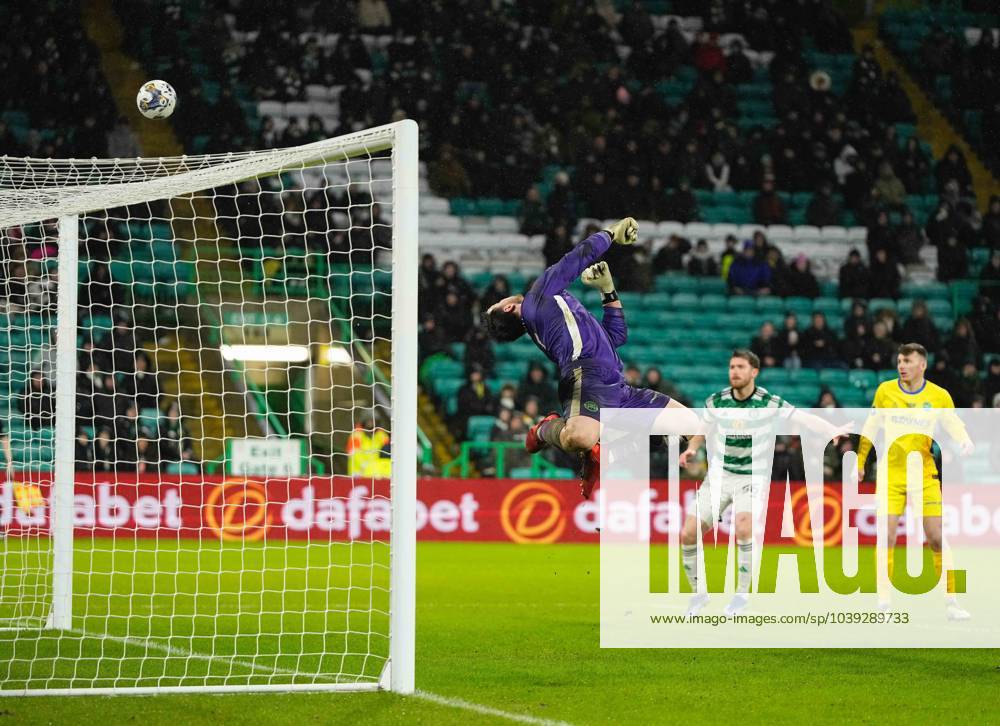 Buckie Thistle goalkeeper Stuart Knight tips a shot over the crossbar ...