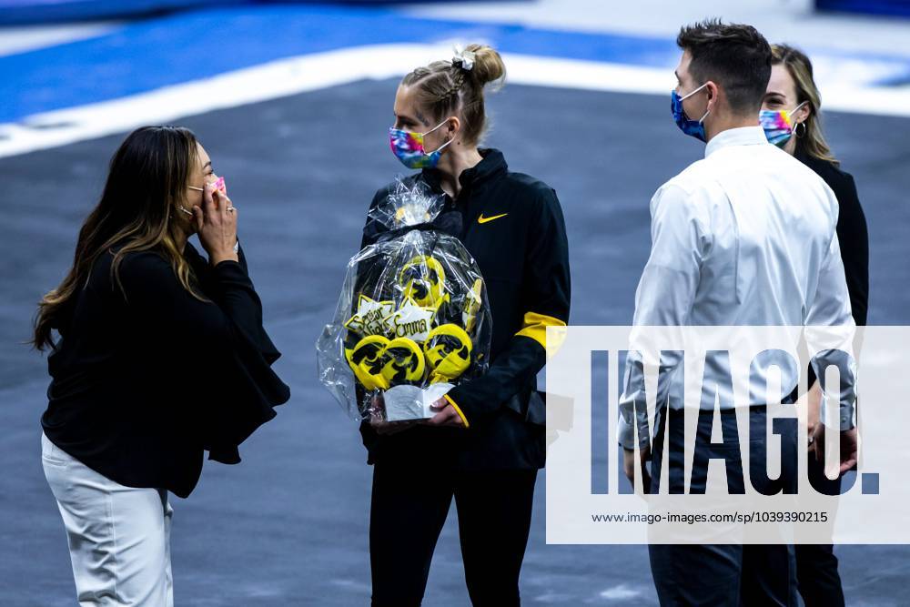 Syndication: HawkCentral Iowa senior Emma Hartzler talks with head ...