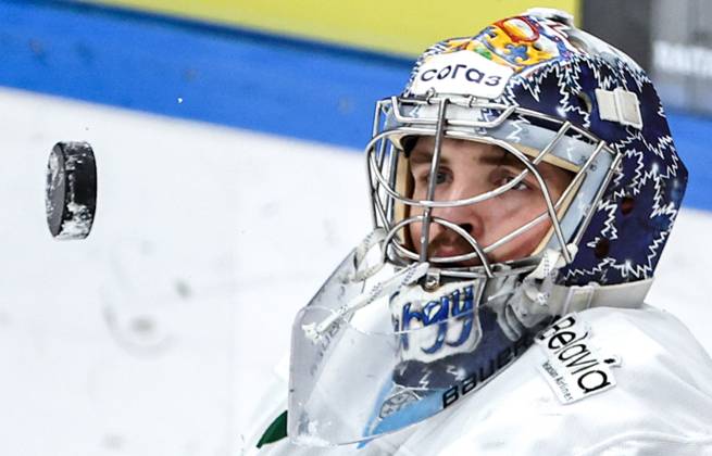 RUSSIA, MOSCOW - : Dinamo goaltender Dylan Ferguson, supported by Nick ...