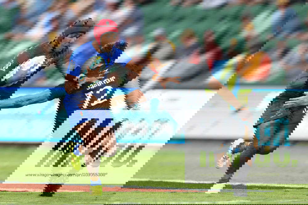 PERTH RUGBY SEVENS, Paul Scanlan of Samoa is tackled by Leroy Carter of ...