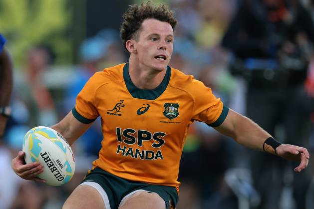 PERTH RUGBY SEVENS, Henry Palmer of Australia is tackled by Morgan ...