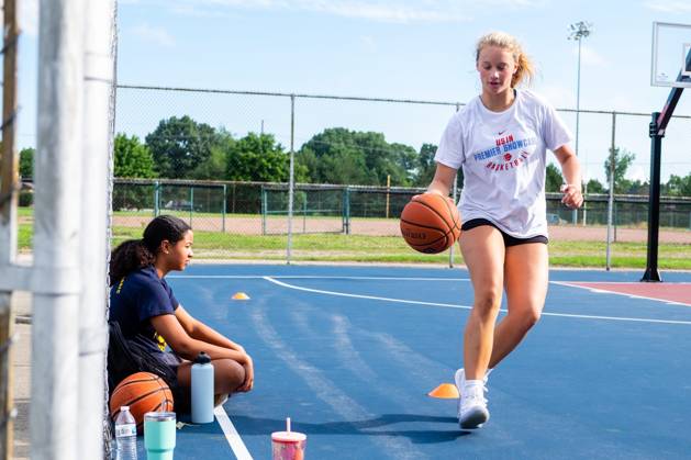 Syndication: PortHuron Port Huron s Julia Gilbert (22) falls after ...