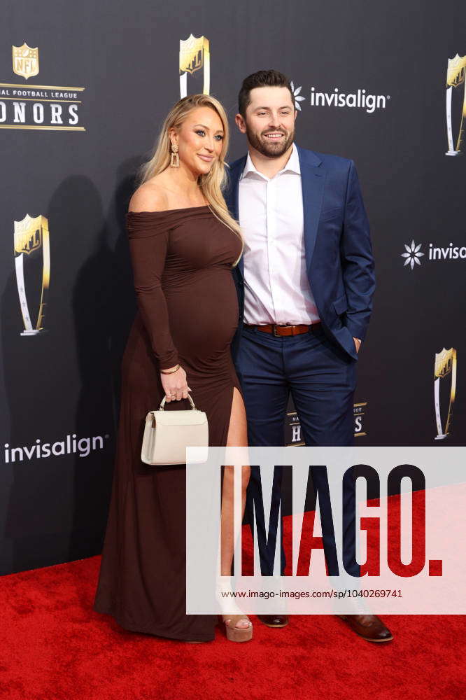 Emily Wilkinson (L) and Baker Mayfield, arrive on the red carpet at the ...