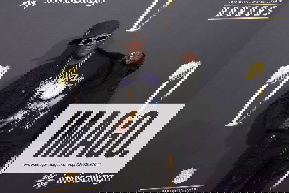 Rap legend Flavor Fla arrives on the red carpet at the NFL, American ...