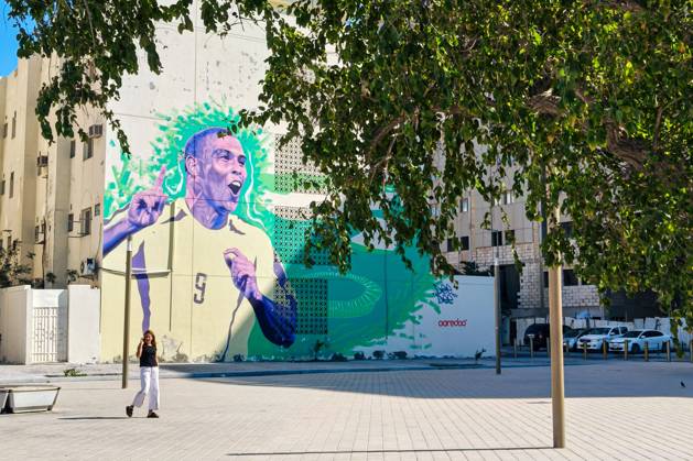 DOHA, QATAR - FEBRUARY 09: A mural of Brazilian former footballer ...