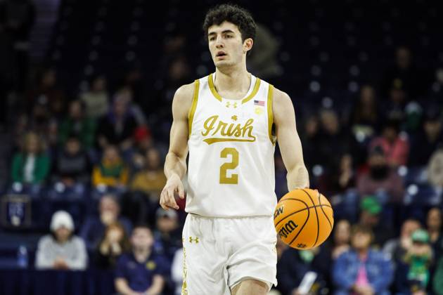 : Notre Dame guard Logan Imes directs the offense during NCAA, College ...