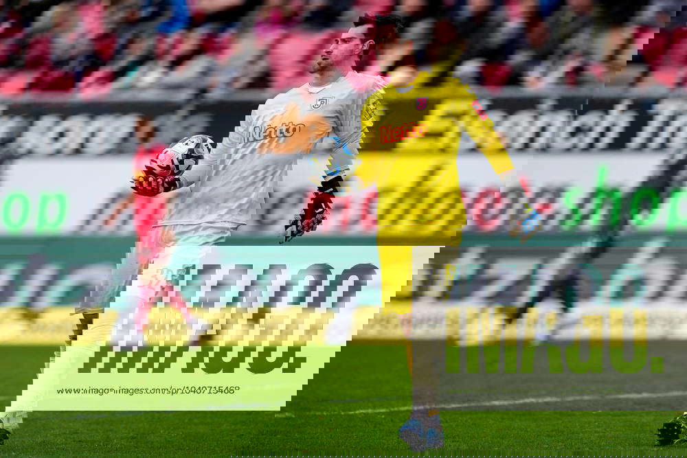 Alexander Weidinger Goalkeeper, Regensburg, 32 , on the ball, cropped ...