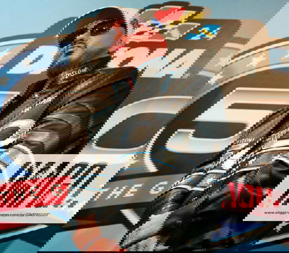 Singer Pitbull, tries on a custom leather leather jacket, after the ...