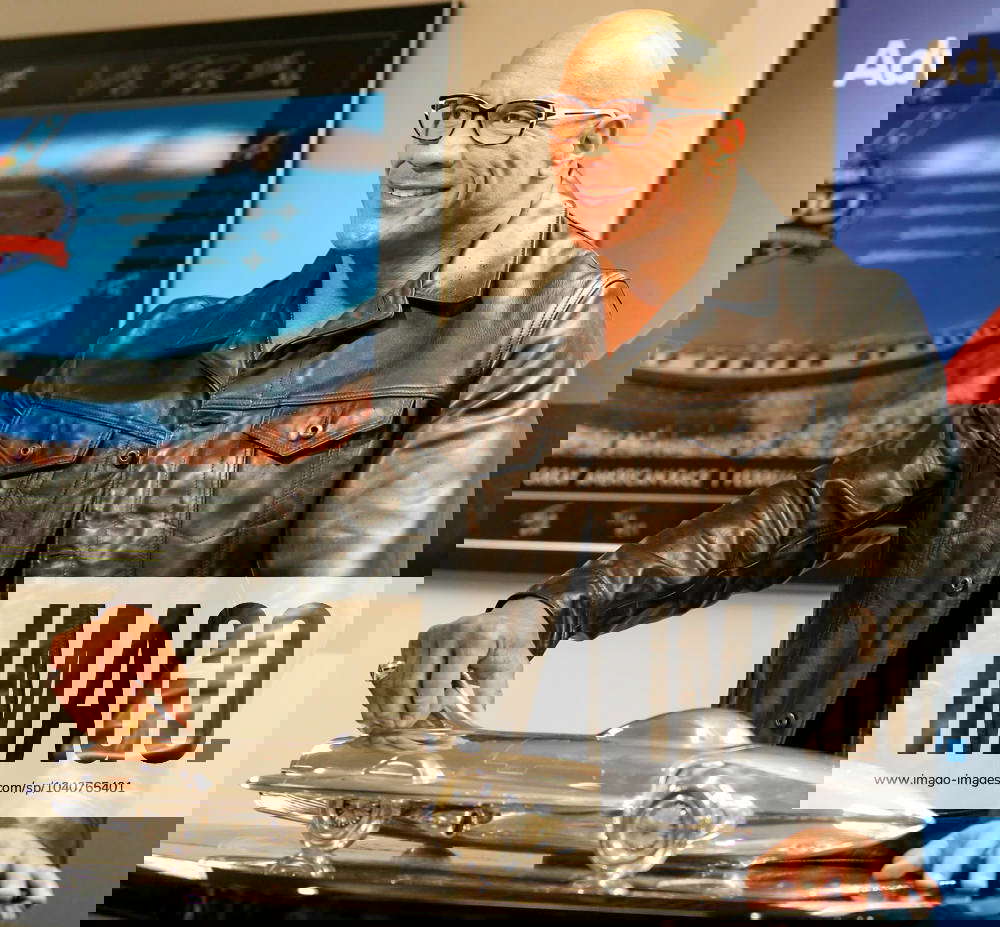 Dwayne Johnson, also known as The Rock , poses with the Harley J Earl ...