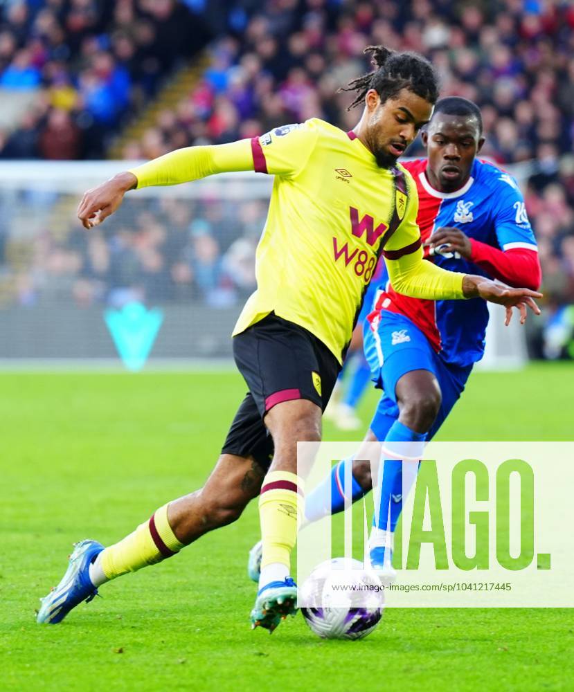 Lorenz Assignon of Burnley under pressure from Tyrick Mitchell of ...