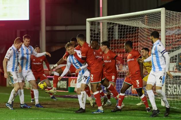 Accrington s Jake Bickerstaff & Walsall s David Okagbue battle in the ...