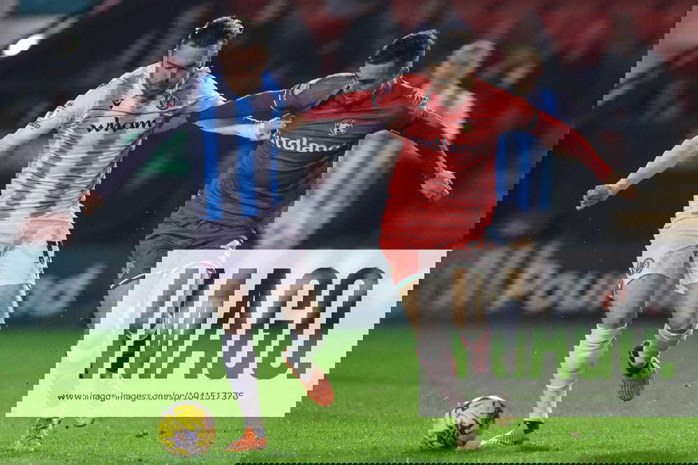 Accrington s Jack Nolan is challenged by Walsall s Taylor Allen during ...