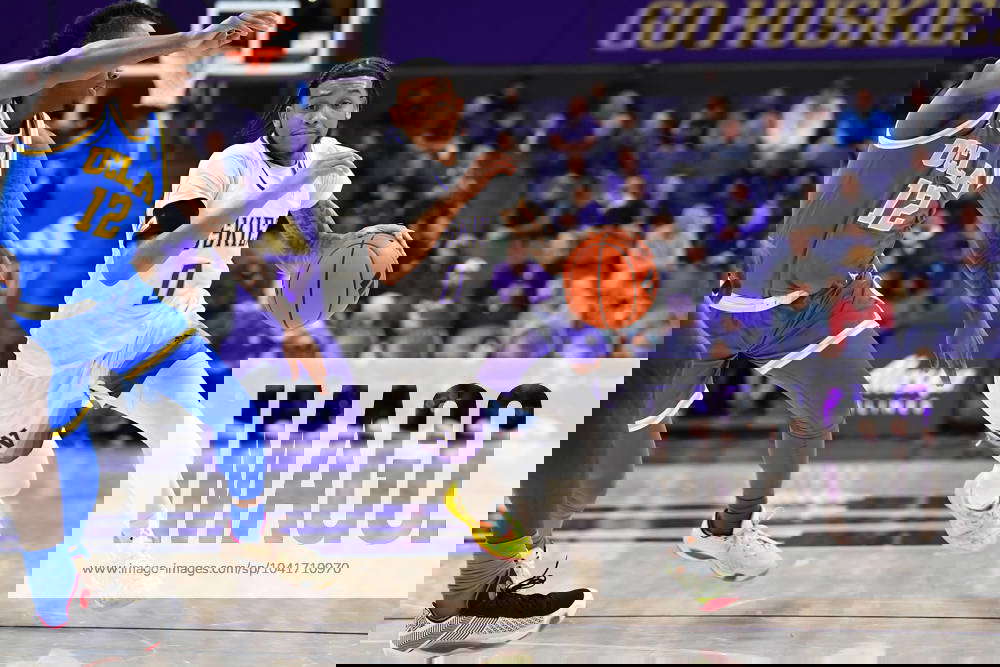 : Washington Huskies guard Koren Johnson drives towards the basket ...