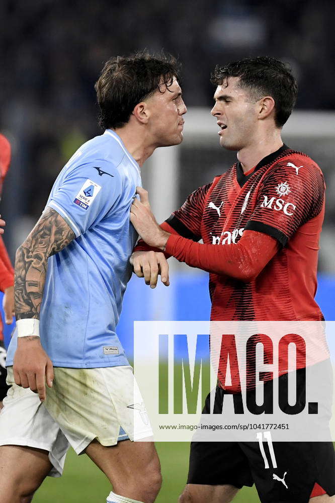 Luca Pellegrini of SS Lazio argues with Christian Pulisic of AC Milan after received a red card