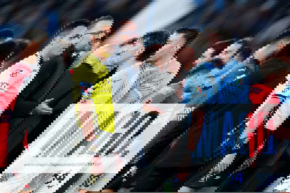 Luca Pellegrini of SS Lazio argues with referee Marco Di Bello during the Serie A match between SS