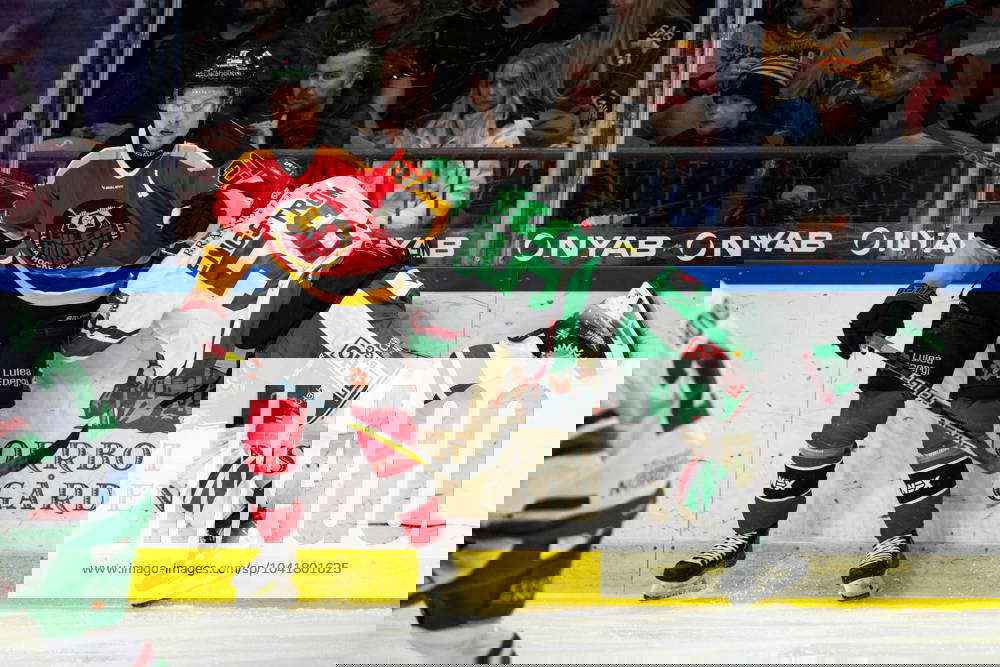 Luleas Juhani Tyrväinen and Rögles Adam Engström during the SHL ice hockey match between Lulea and