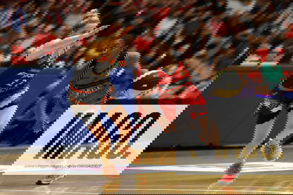 WNBL LYNX FIRE, Aari McDonald of the Lynx drives past Sami Whitcomb of ...