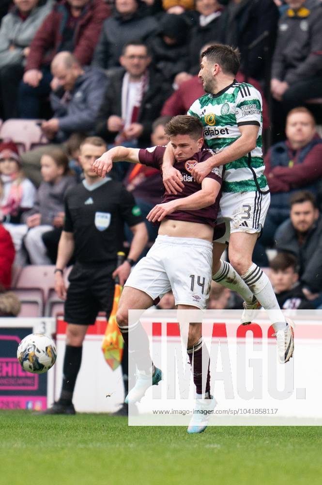 Celtic s Greg Taylor challenges Hearts Cameron Devlin for the ball Heart of Midlothian v Celtic
