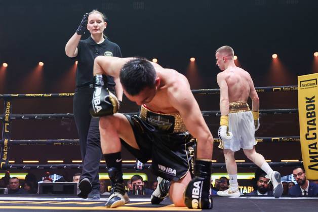 RUSSIA, KRASNODAR REGION - : A referee counts after a knockdown in a boxing bout between