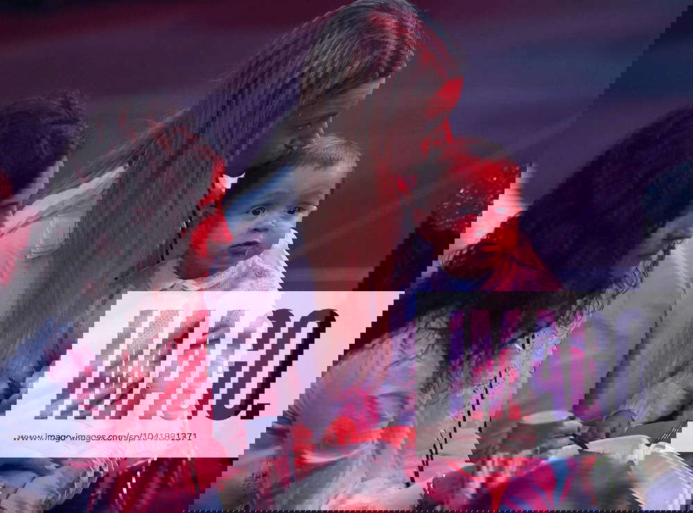 The baby son of Rafael Nadal sits with Nada s wife and sister during ...