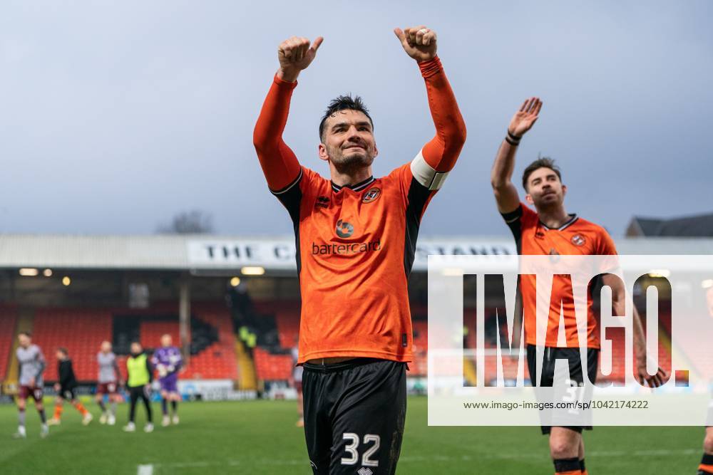Tony Watt and Declan Gallagher of Dundee United applaud their fans ...