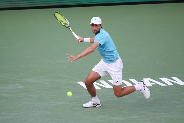 INDIAN WELLS, CA - MARCH 09: Aleksandar Vukic hits a forehand during ...