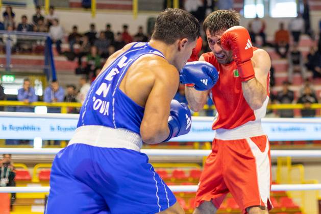 Boxing match - Boxing Road to Paris Odajev Saparmyrat in red and Cova ...