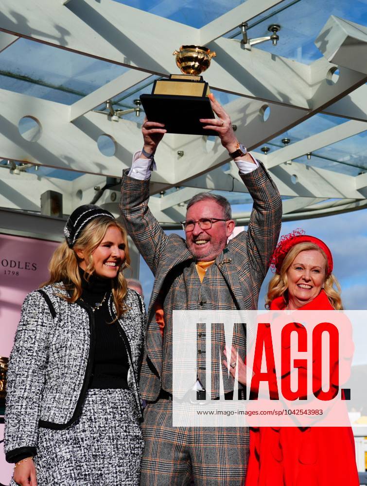 Greg Turley lifts the Gold Cup with Audrey Turley and daughter Sarah ...