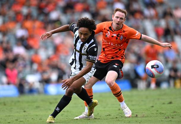 ALEAGUE ROAR MACARTHUR, Kealey Adamson (left) of the Bulls takes on ...